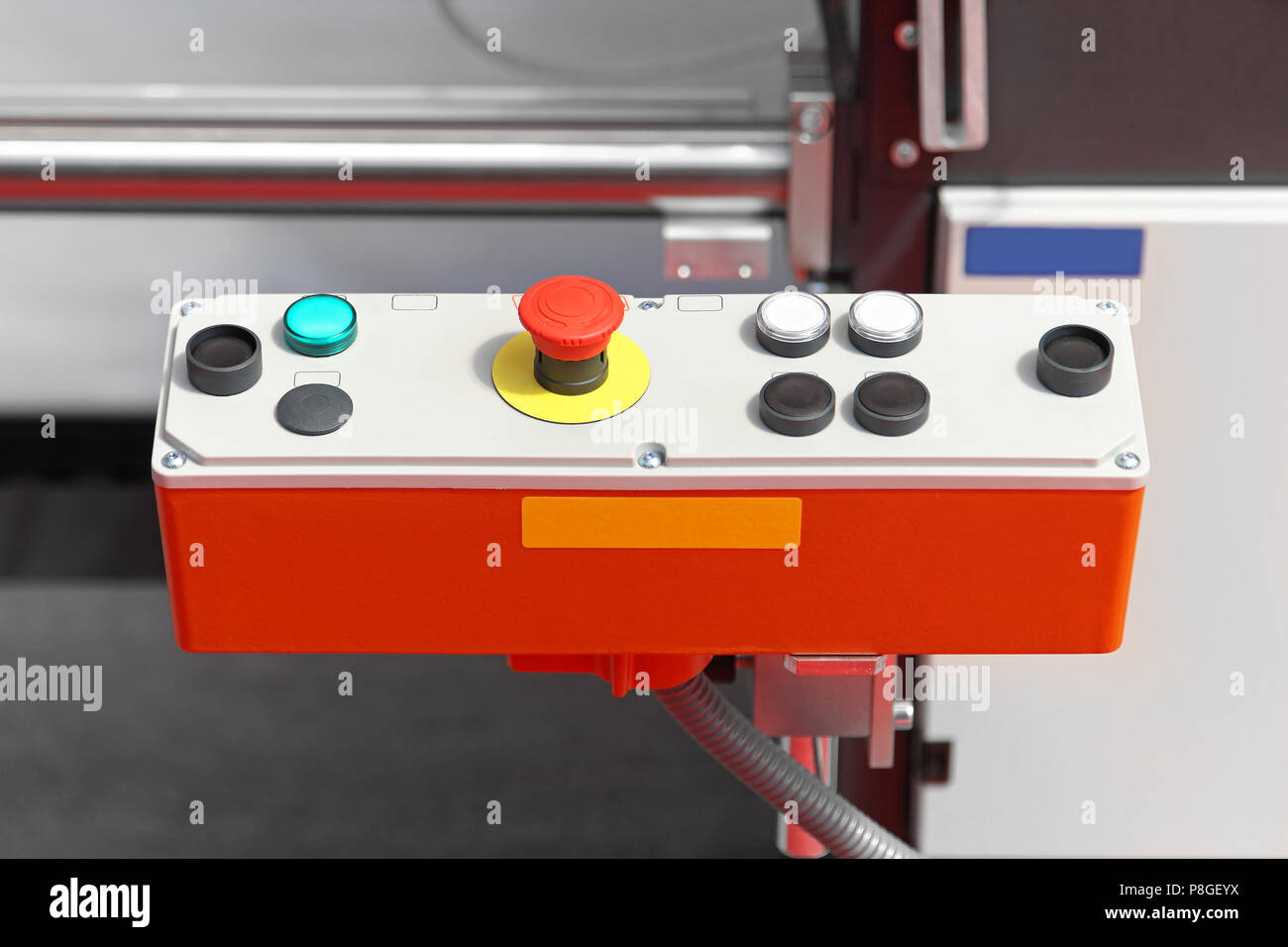 Machine control panel with red push button Stock Photo - Alamy