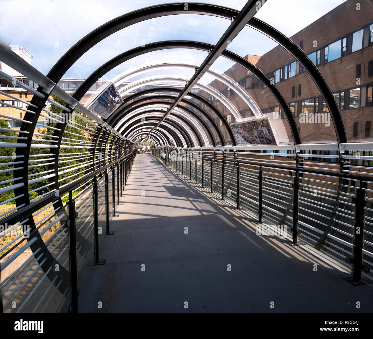 Modern pedestrian link bridge Stock Photo - Alamy