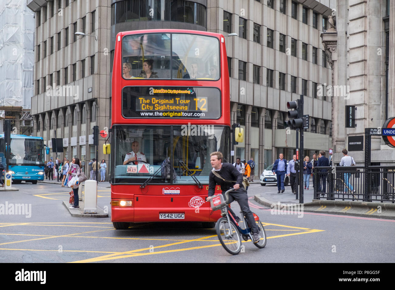 Red London bus and cyclist, London, England Stock Photo - Alamy