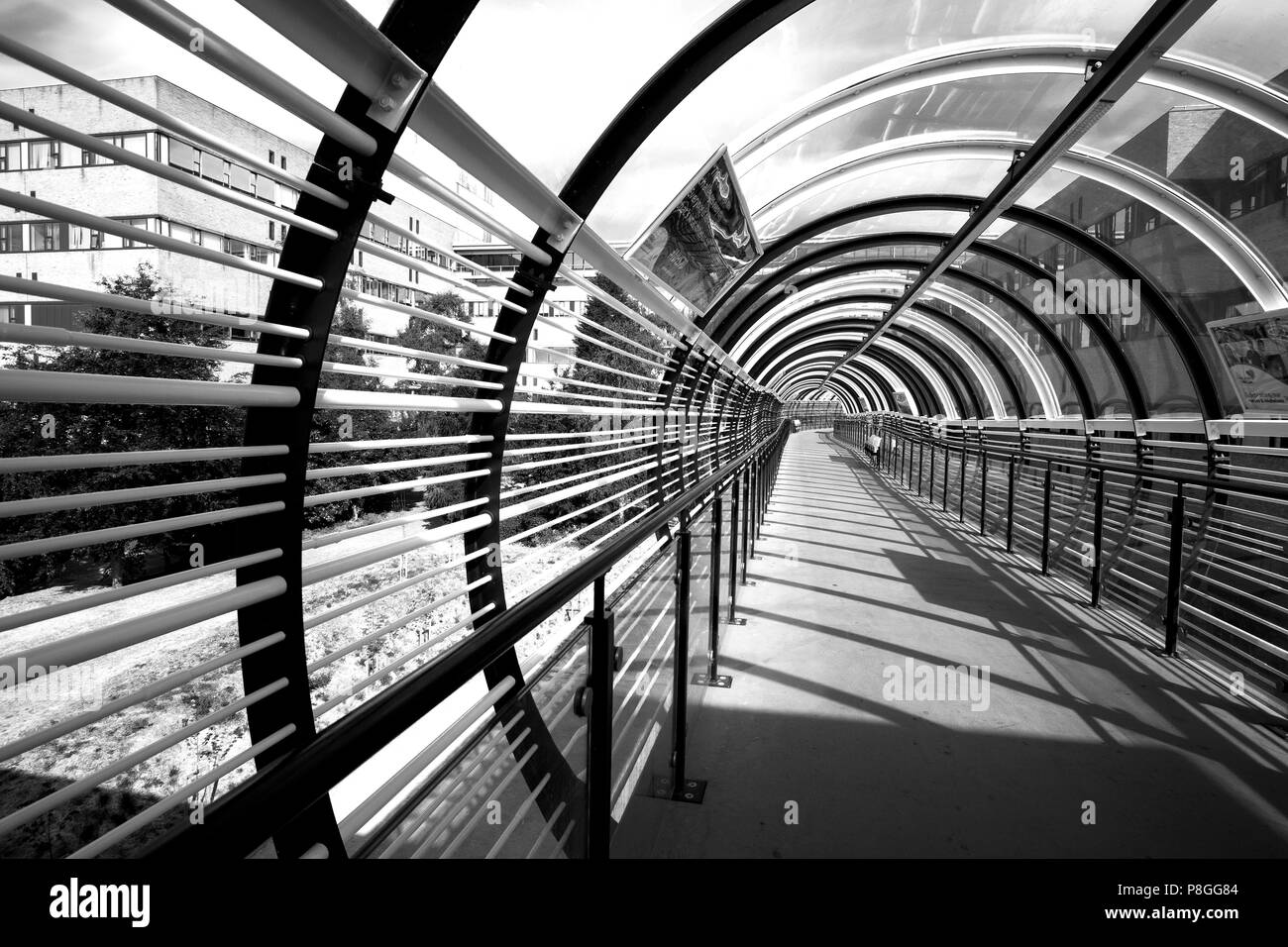 Modern pedestrian link bridge Stock Photo - Alamy