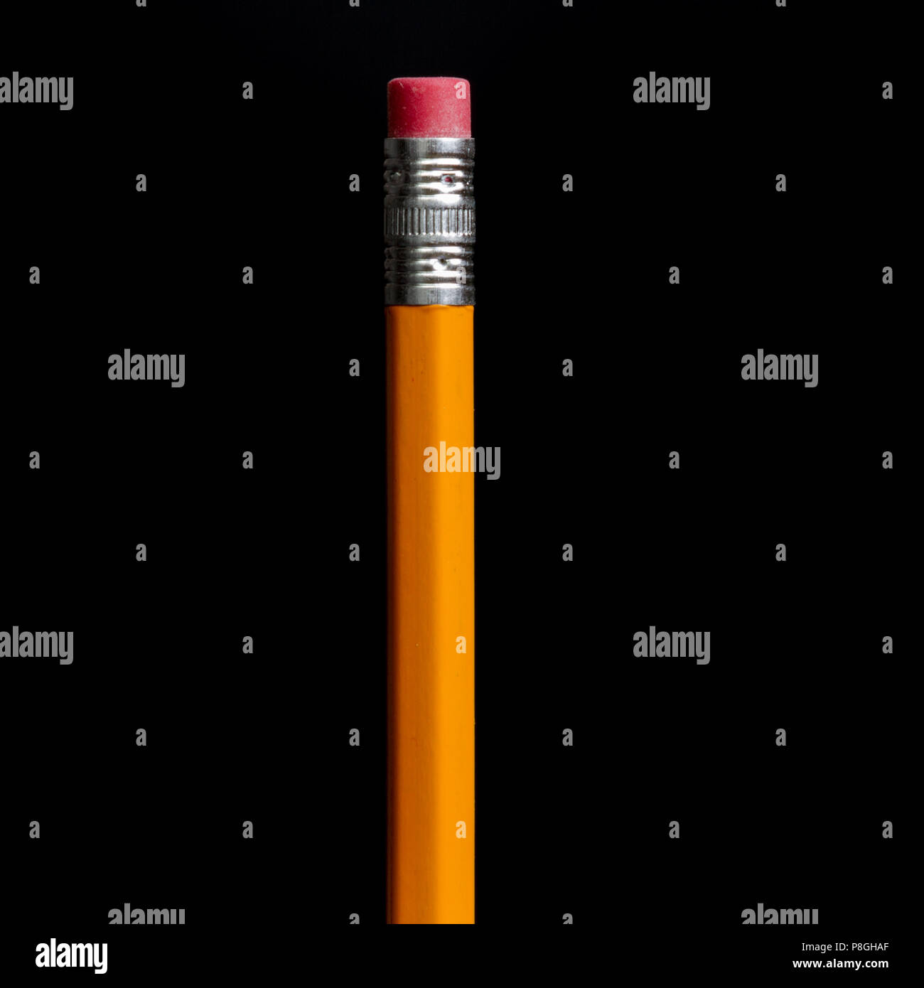Single pencil against a black background Stock Photo - Alamy