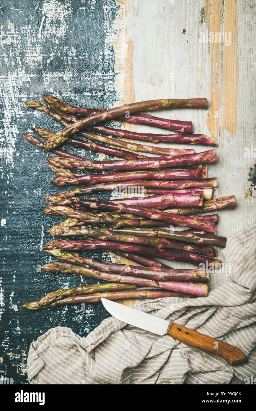 Seasonal harvest produce. Flat-lay of fresh raw uncooked purple ...