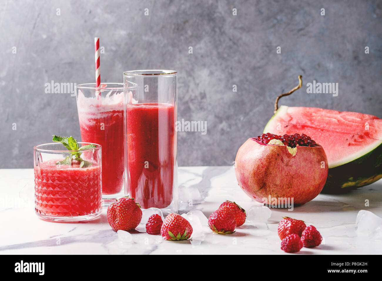 Three different red fruit berry watermelon, strawberry, raspberry ...