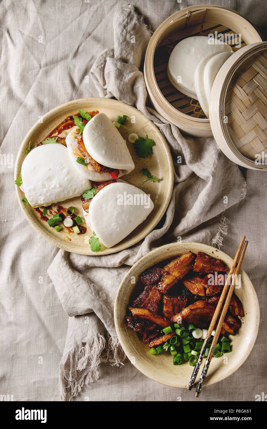 Asian sandwich steamed gua bao buns with pork belly, greens and ...