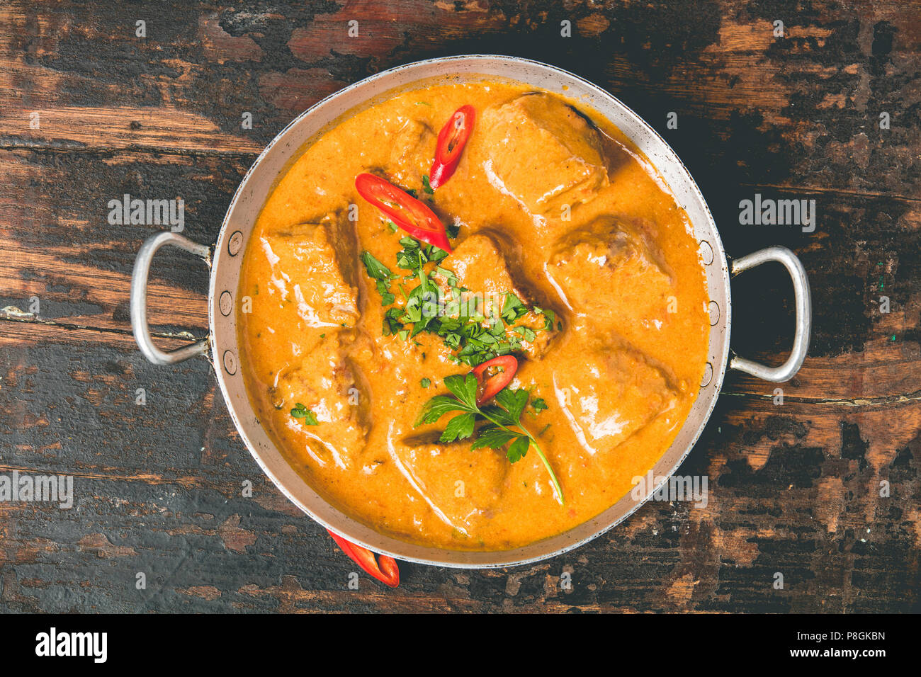 Traditional curry on dark background. Top view, flat lay Stock Photo ...