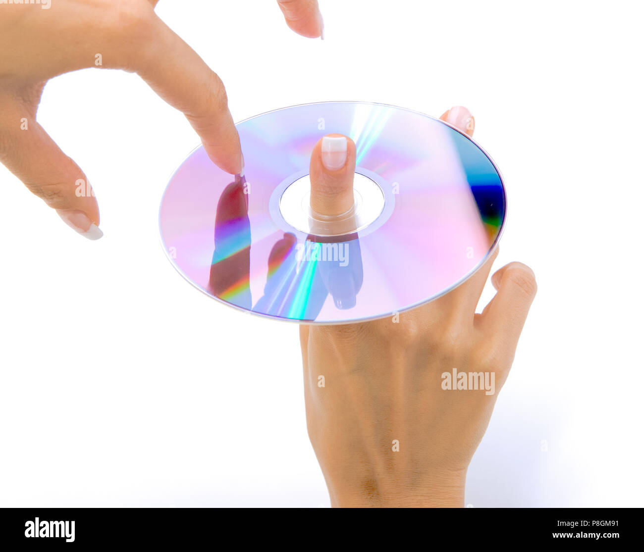 Female hand hold DVD isolated on white Stock Photo - Alamy