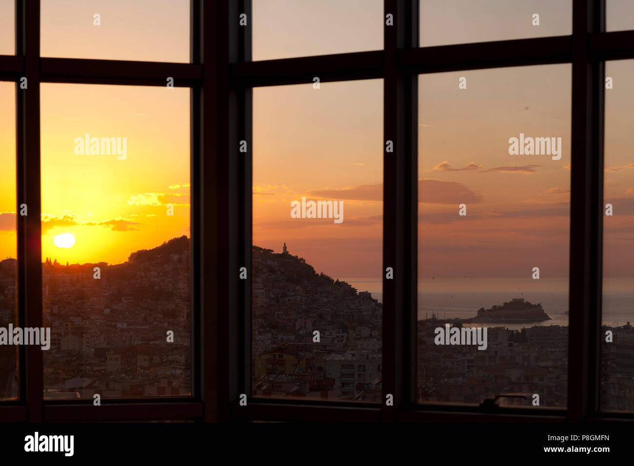 Sunset windows, most beautiful golden light Kuşadası through windows ...