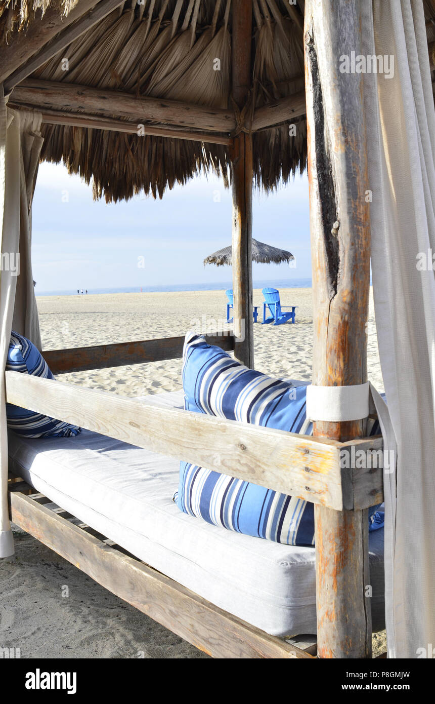 tropical outdoor beach bed luxury relaxation glamping palm thatched ...