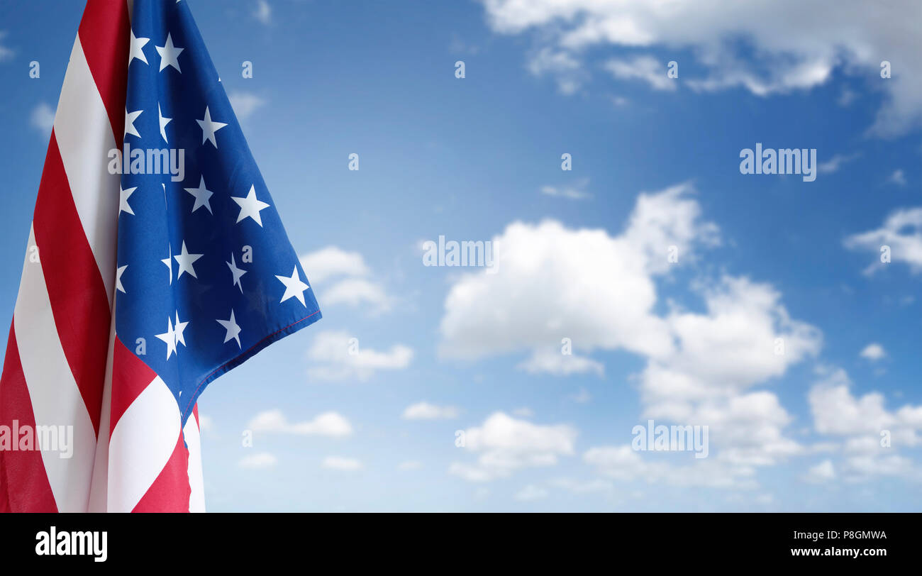 American flag in blue sky Stock Photo - Alamy