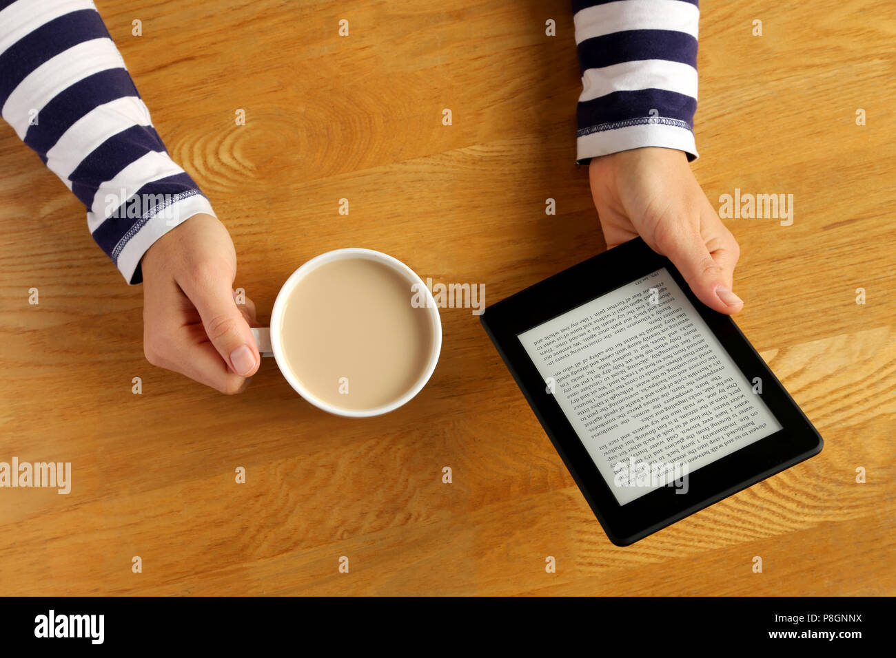 Hand holding electronic book hi-res stock photography and images - Alamy