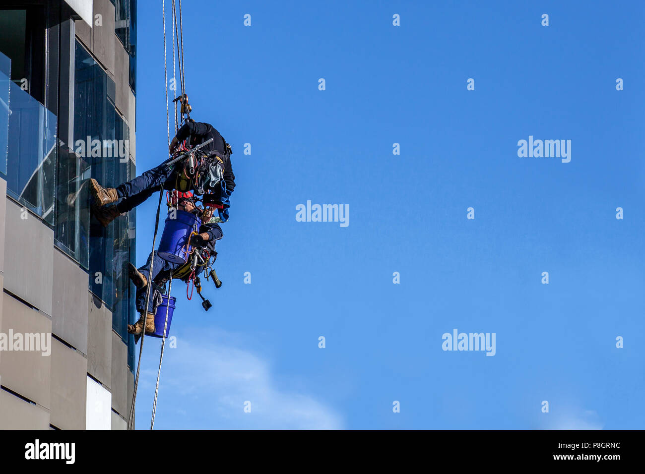 Window Cleaners on a high rise building Stock Photo - Alamy