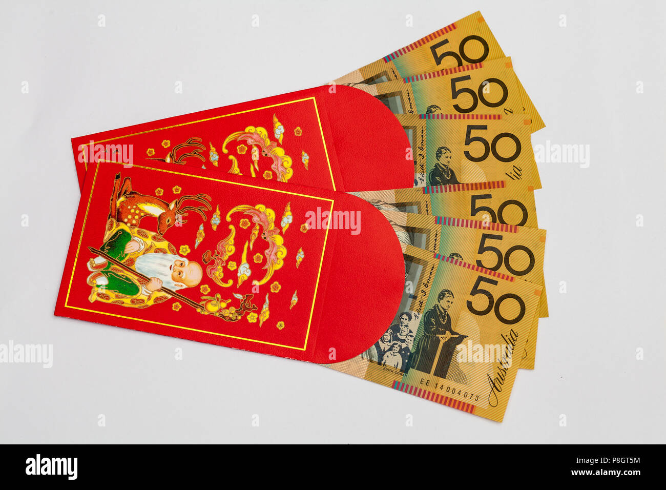 Chinese Red pocket with Australian money inside Stock Photo - Alamy