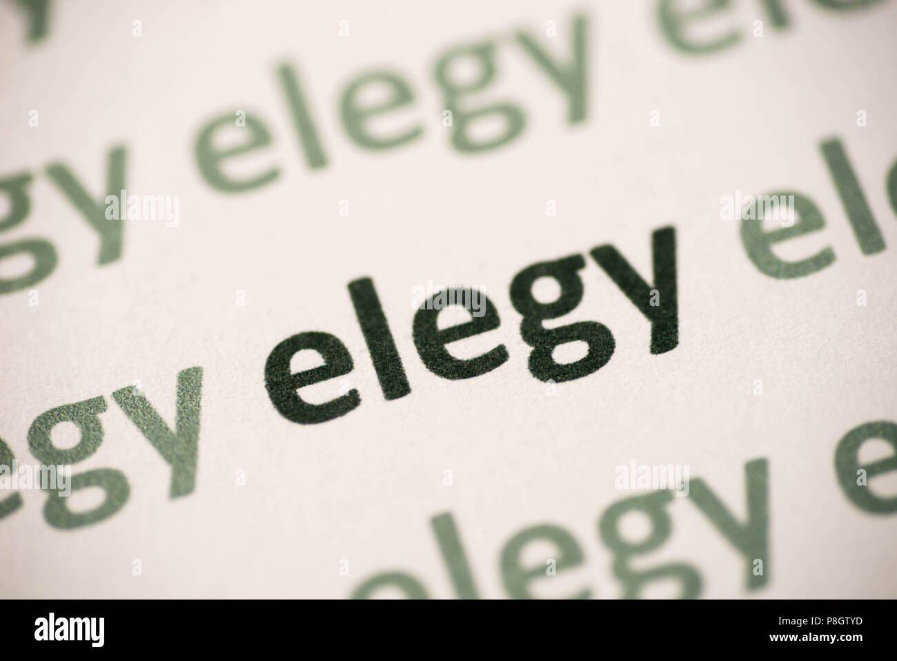 word elegy printed on white paper macro Stock Photo - Alamy
