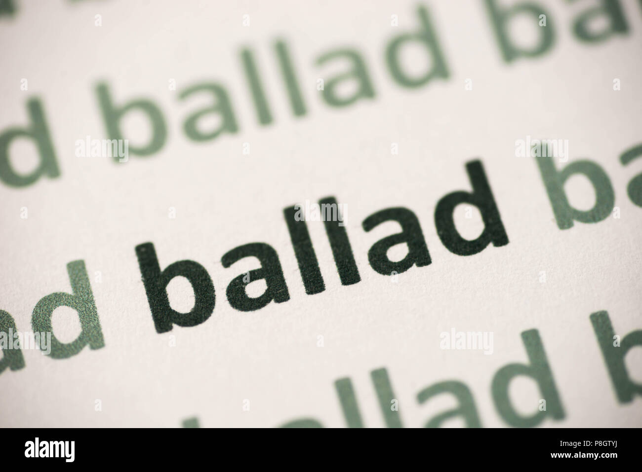 word ballad printed on white paper macro Stock Photo - Alamy