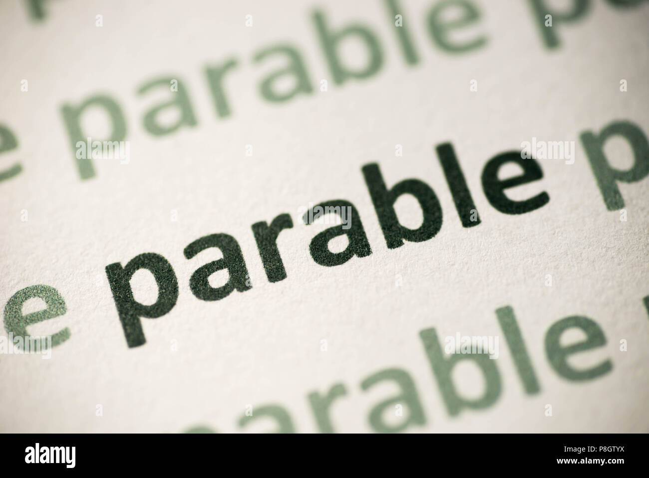 word parable printed on white paper macro Stock Photo - Alamy