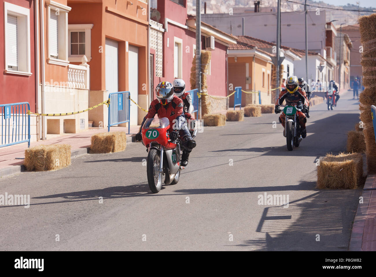 Classic Motorcycle racing in the streets of Alguena, Spain Stock Photo ...