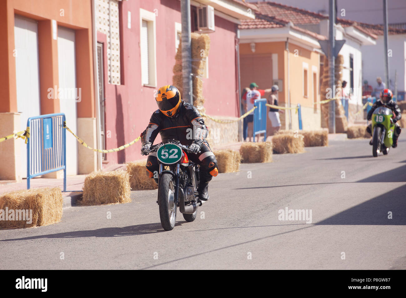 Classic Motorcycle racing in the streets of Alguena, Spain Stock Photo ...