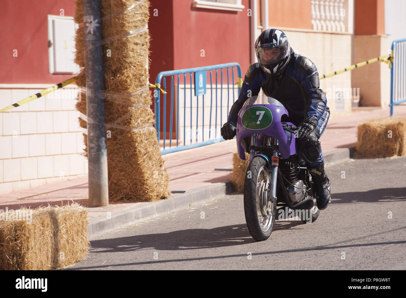 Classic Motorcycle racing in the streets of Alguena, Spain Stock Photo ...
