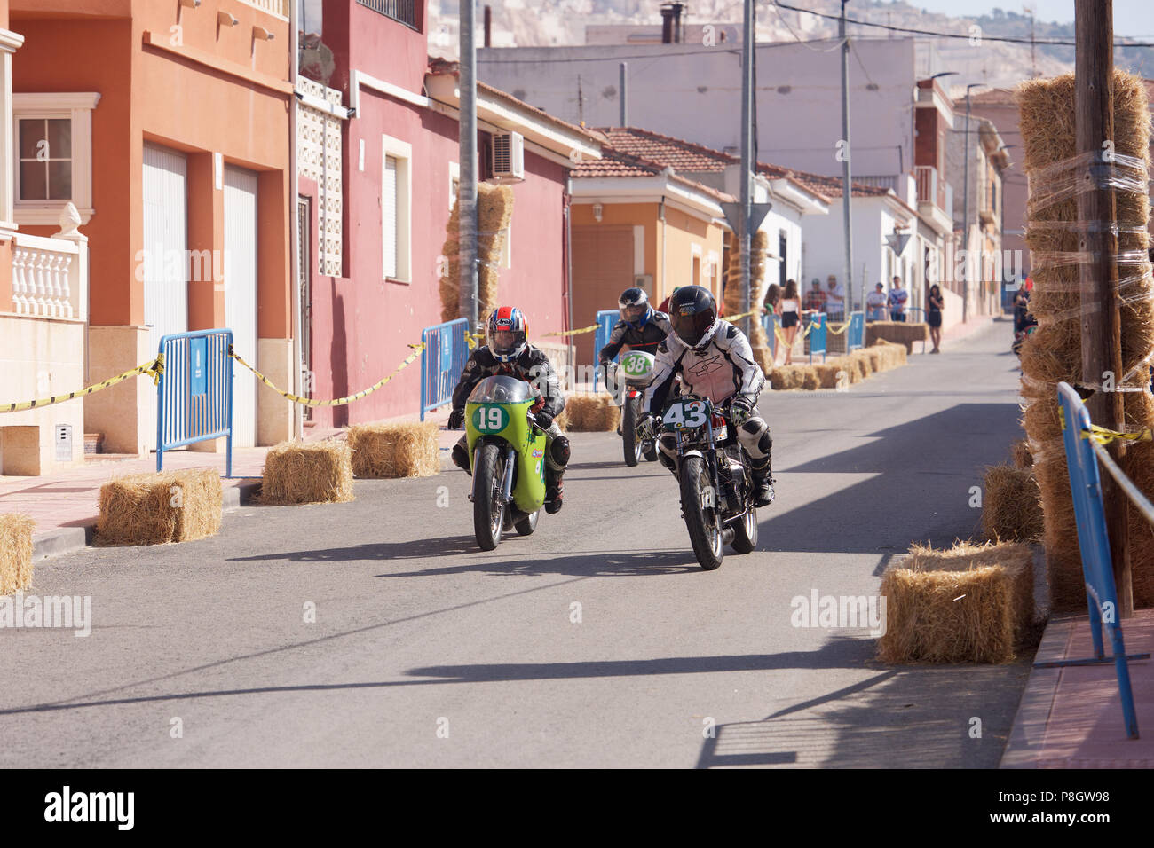 Classic Motorcycle racing in the streets of Alguena, Spain Stock Photo ...