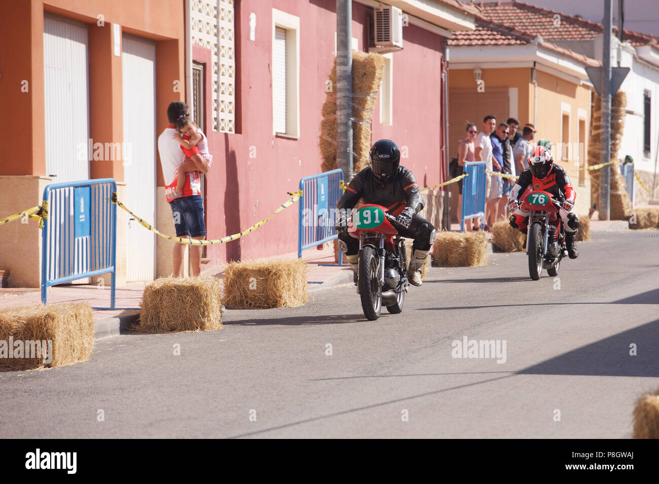 Classic Motorcycle racing in the streets of Alguena, Spain Stock Photo ...