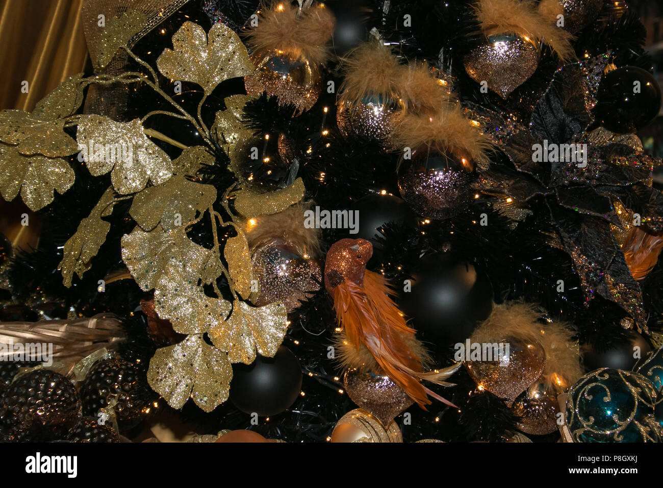 Dark Christmas tree on a living room Stock Photo - Alamy