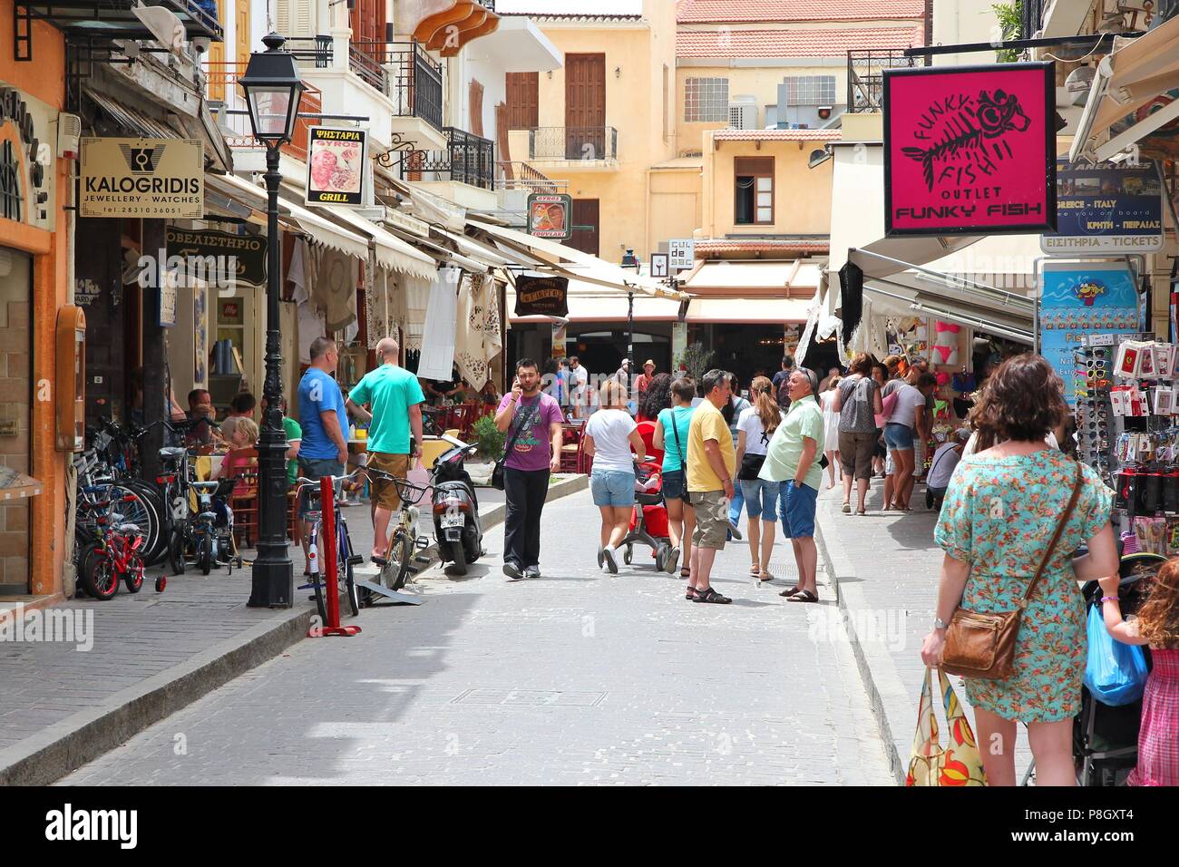 RETHYMNON, GREECE - MAY 23: People visit Old Town on May 23, 2013 in ...