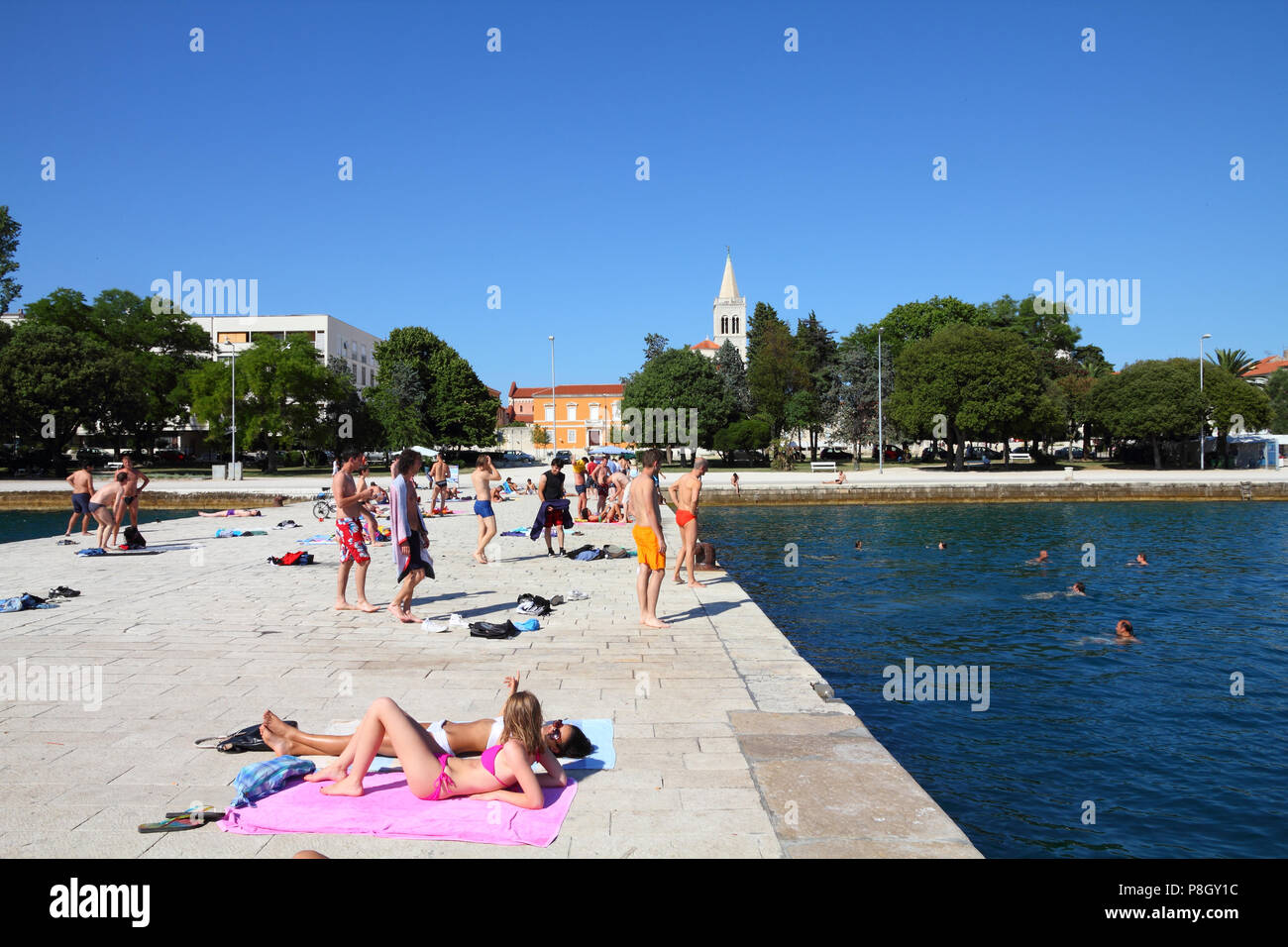 ZADAR, CROATIA - JUNE 22: Tourists enjoy Mediterranean Sea on June 22 ...