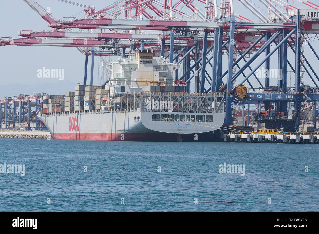 The Container Ship, OOCL TAIPAI, Loading And Unloading In The Long ...