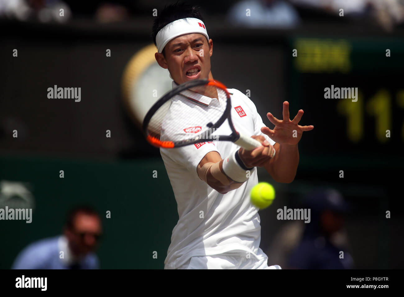 Kei nishikori competing at wimbledon hi-res stock photography and ...