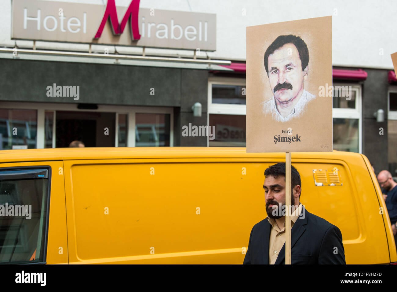 Munich, Germany. 11th July, 2018. Kerim Simsek, son Enver Simsek, who ...