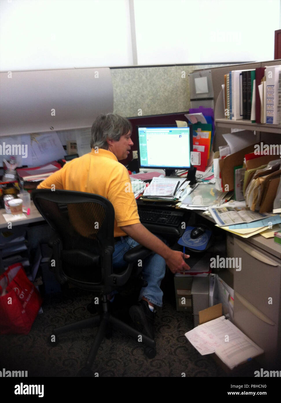 80th Anniversary Celebration . Nick Baric is at his desk composing an ...