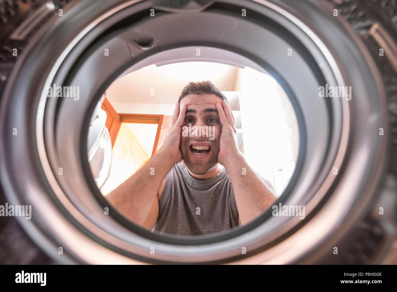 Wash washing machine clothes view from inside drum tumble person hi-res ...