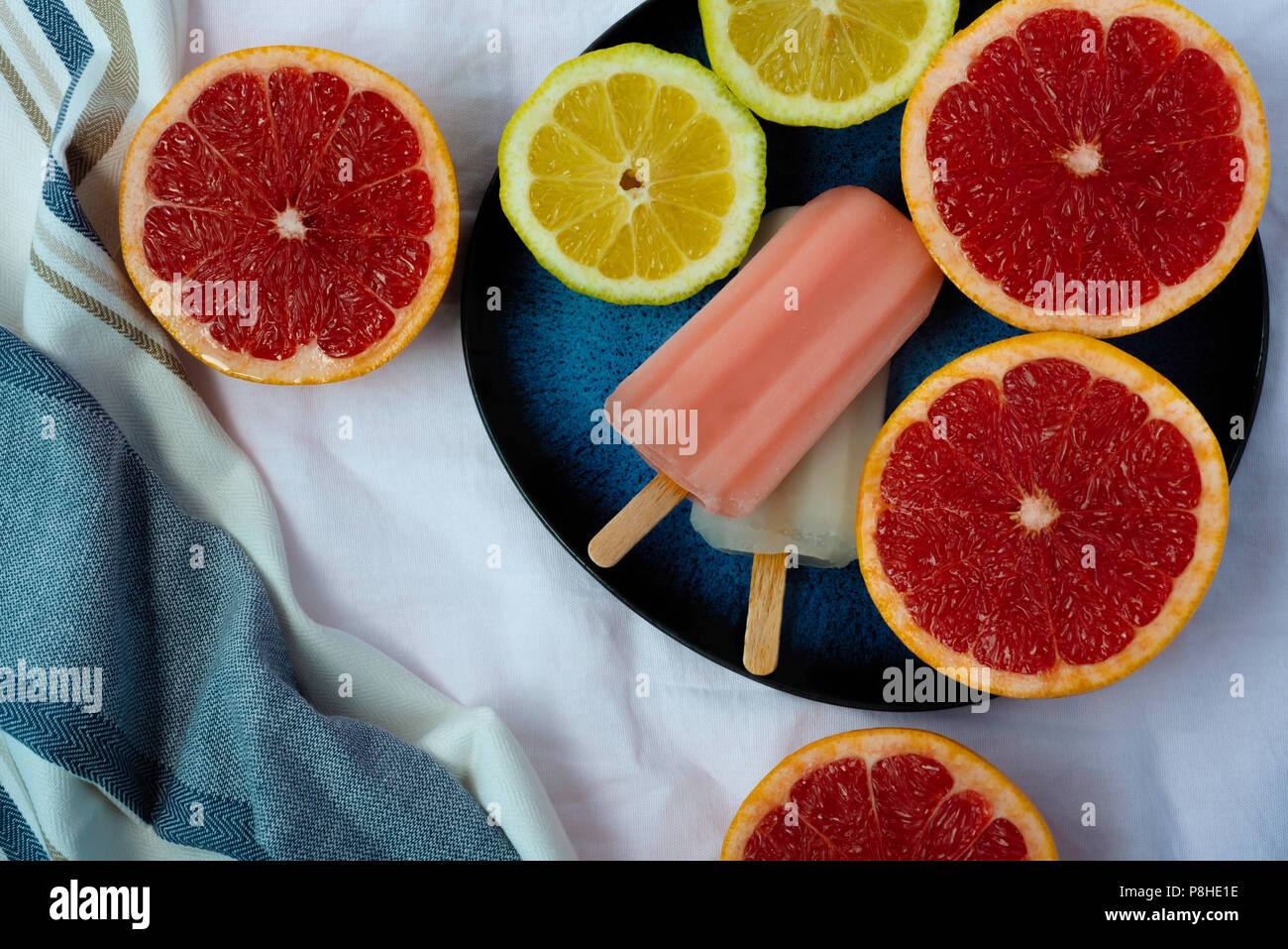healthy vegetarian dessert, citrus fruits and hand made popsicles, ice ...