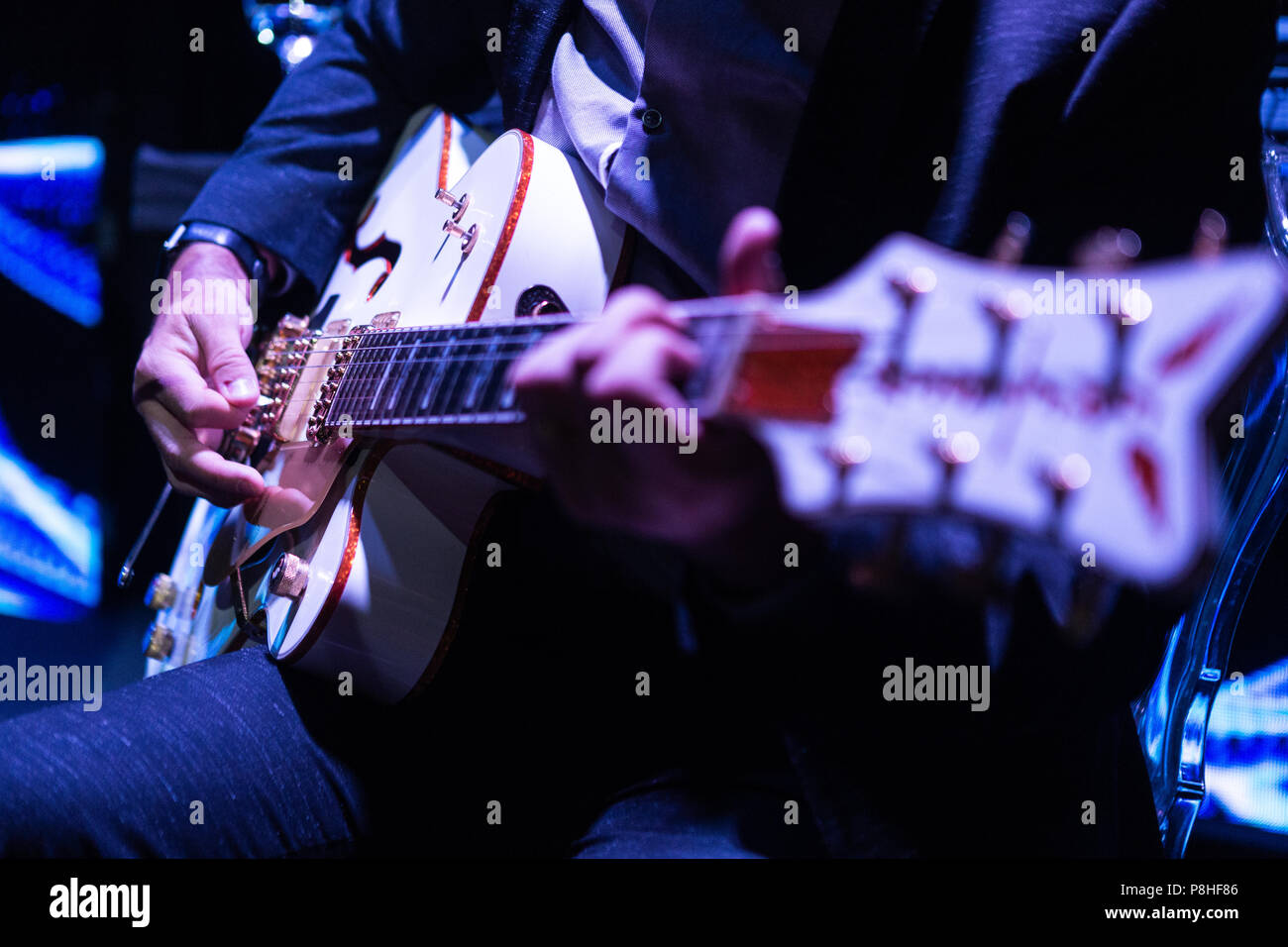 Person with guitar hi-res stock photography and images - Alamy