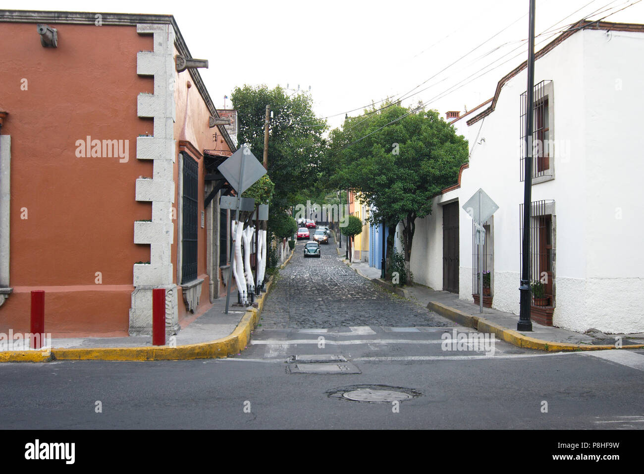 Copilco, Mexico City, Mexico - 2018: A typical cobblestone street with ...