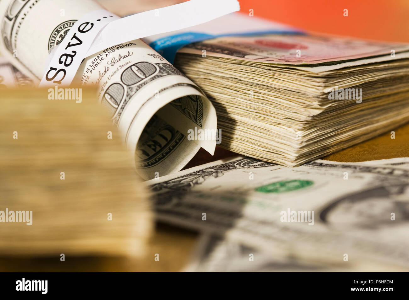 pile of dollar currency on a table Stock Photo - Alamy