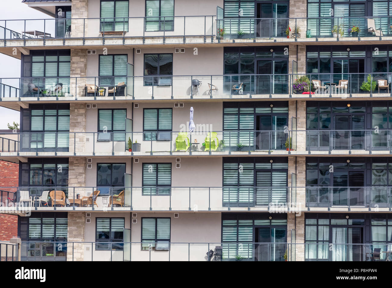 Condo Balconies with Chairs Stock Photo - Alamy