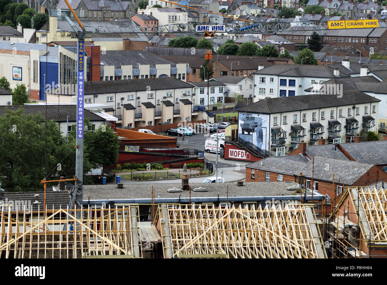 The Derry Walls overlooking the Bogside area of the city Stock Photo ...