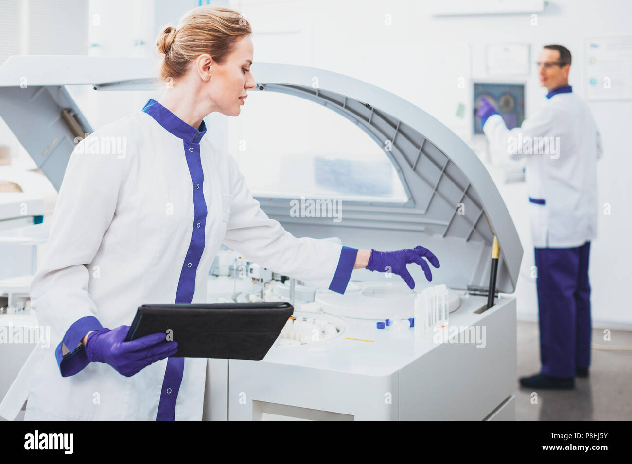 Laboratory worker taking test hi-res stock photography and images - Alamy