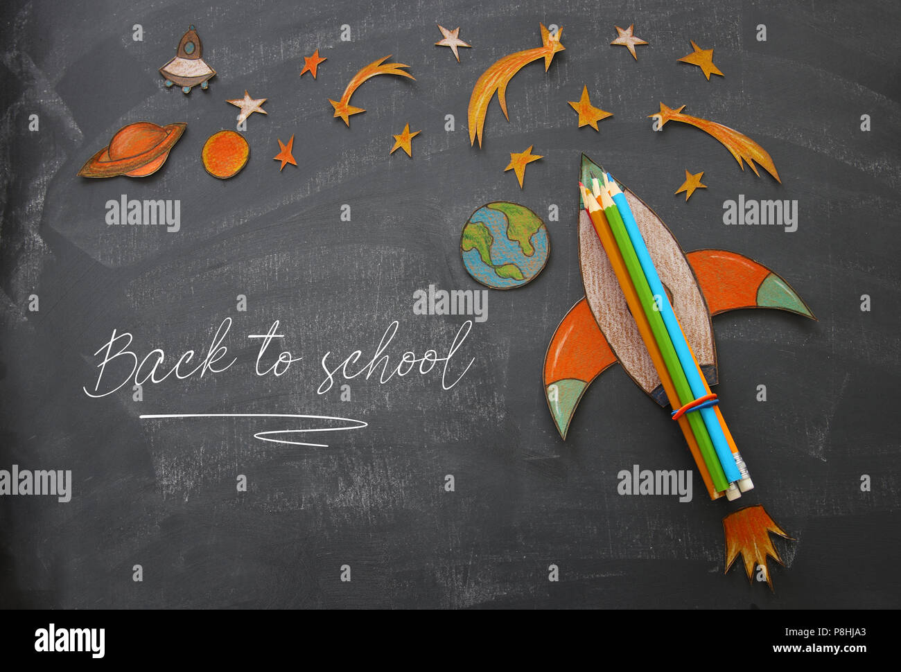 Back to school concept. rocket, space elements shapes cut from paper ...