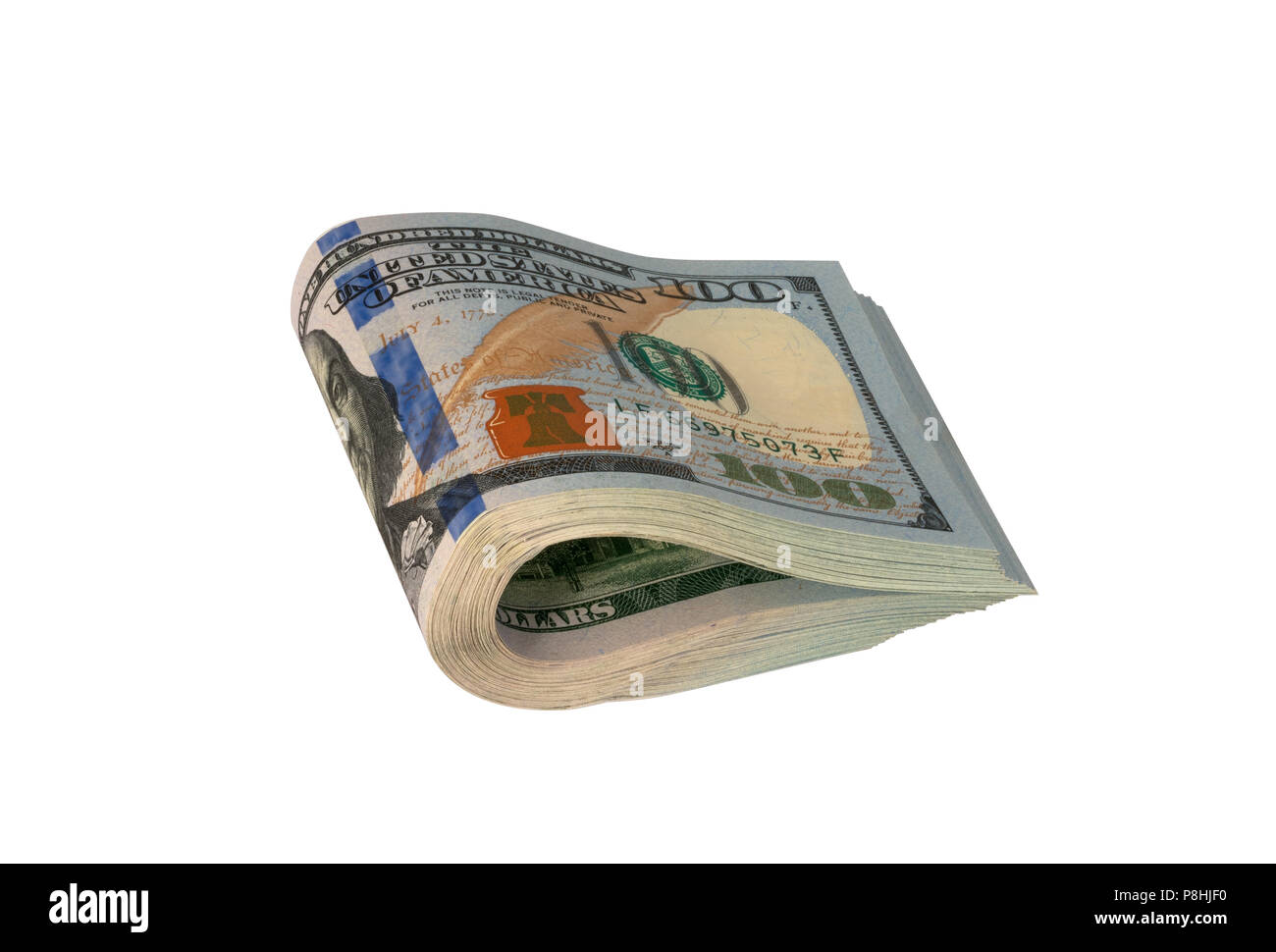 Dollar folded in half on a white background Stock Photo - Alamy