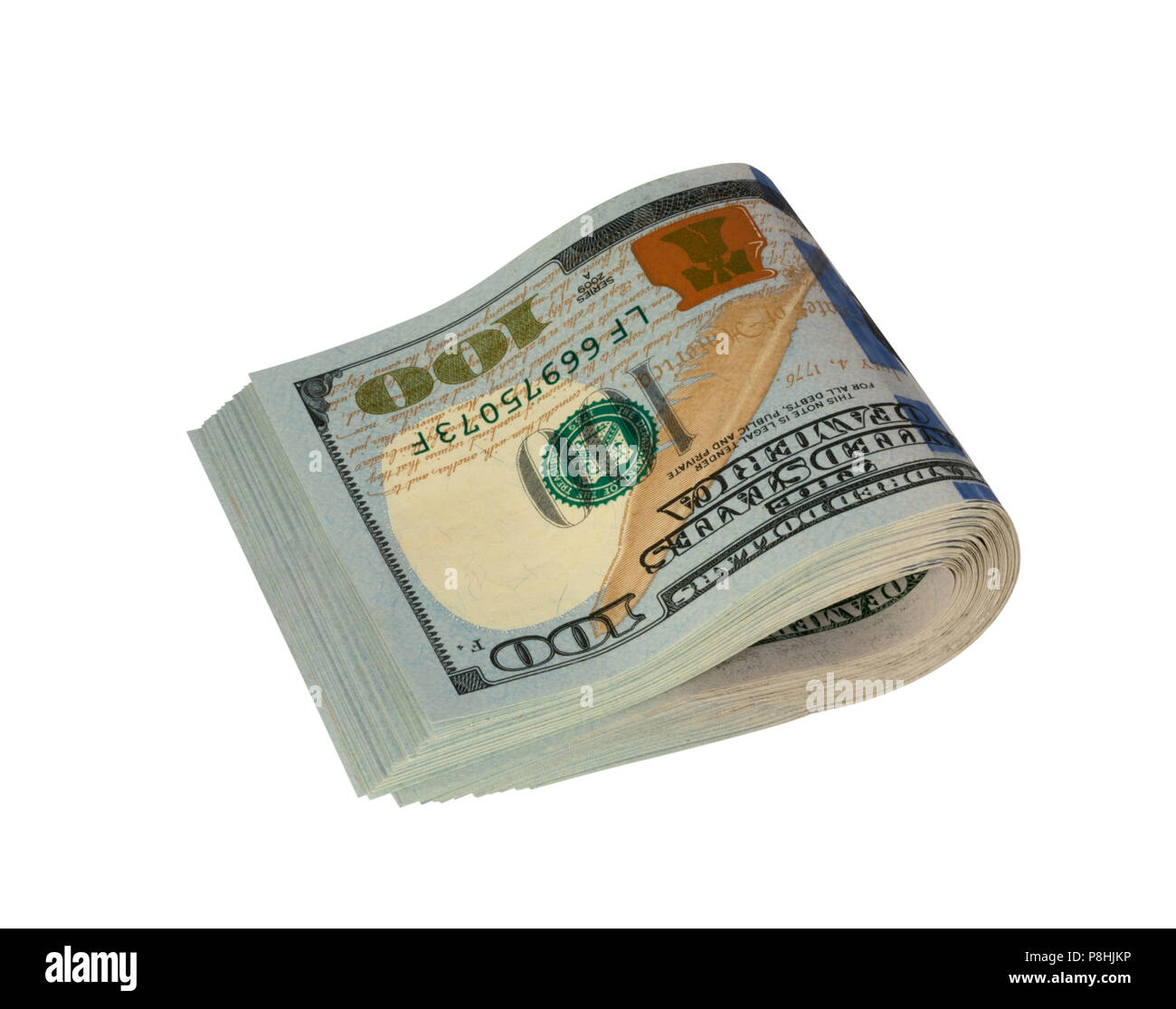 Dollar folded in half on a white background Stock Photo - Alamy