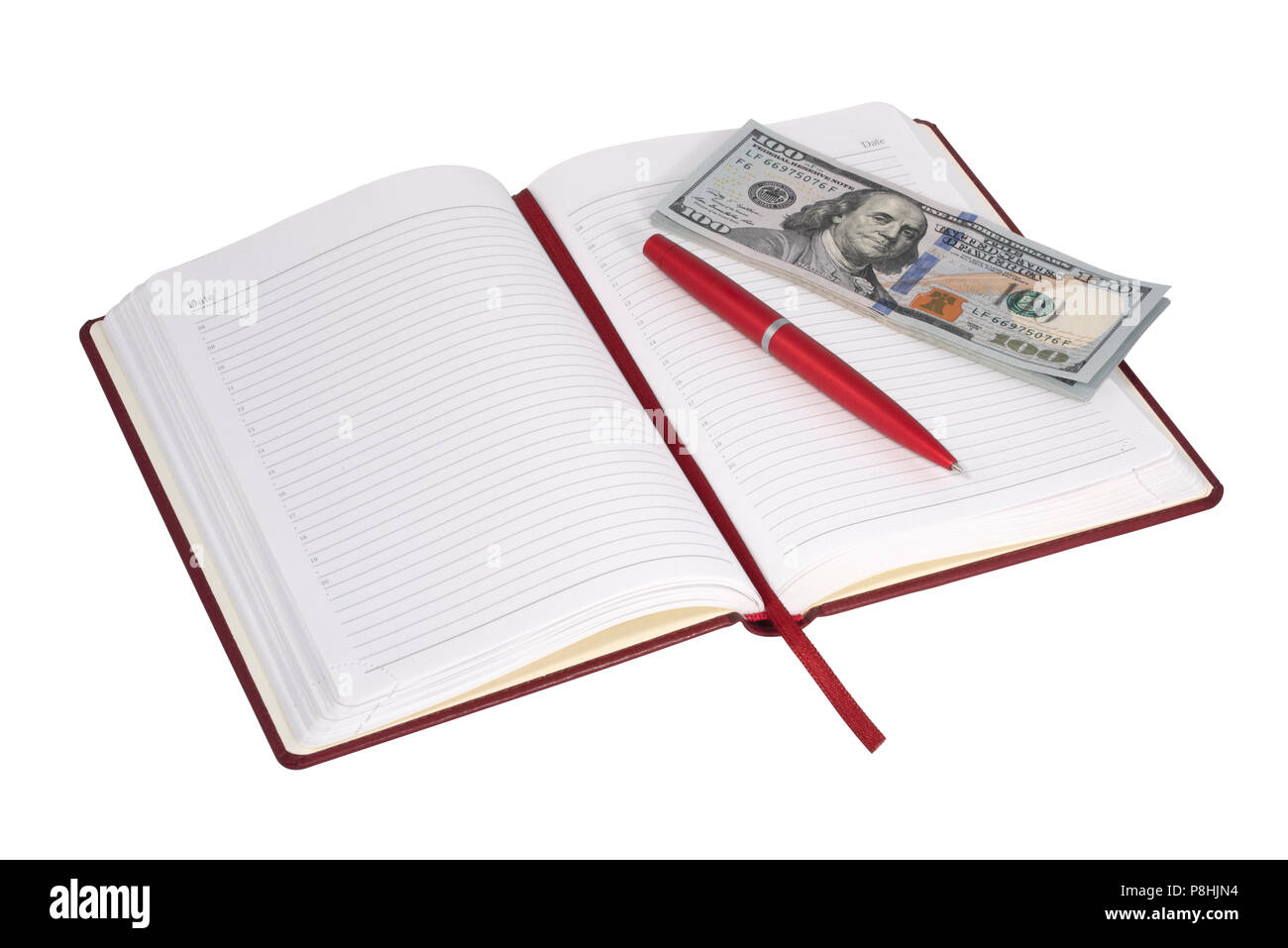 Open notebook and money on a white background Stock Photo - Alamy