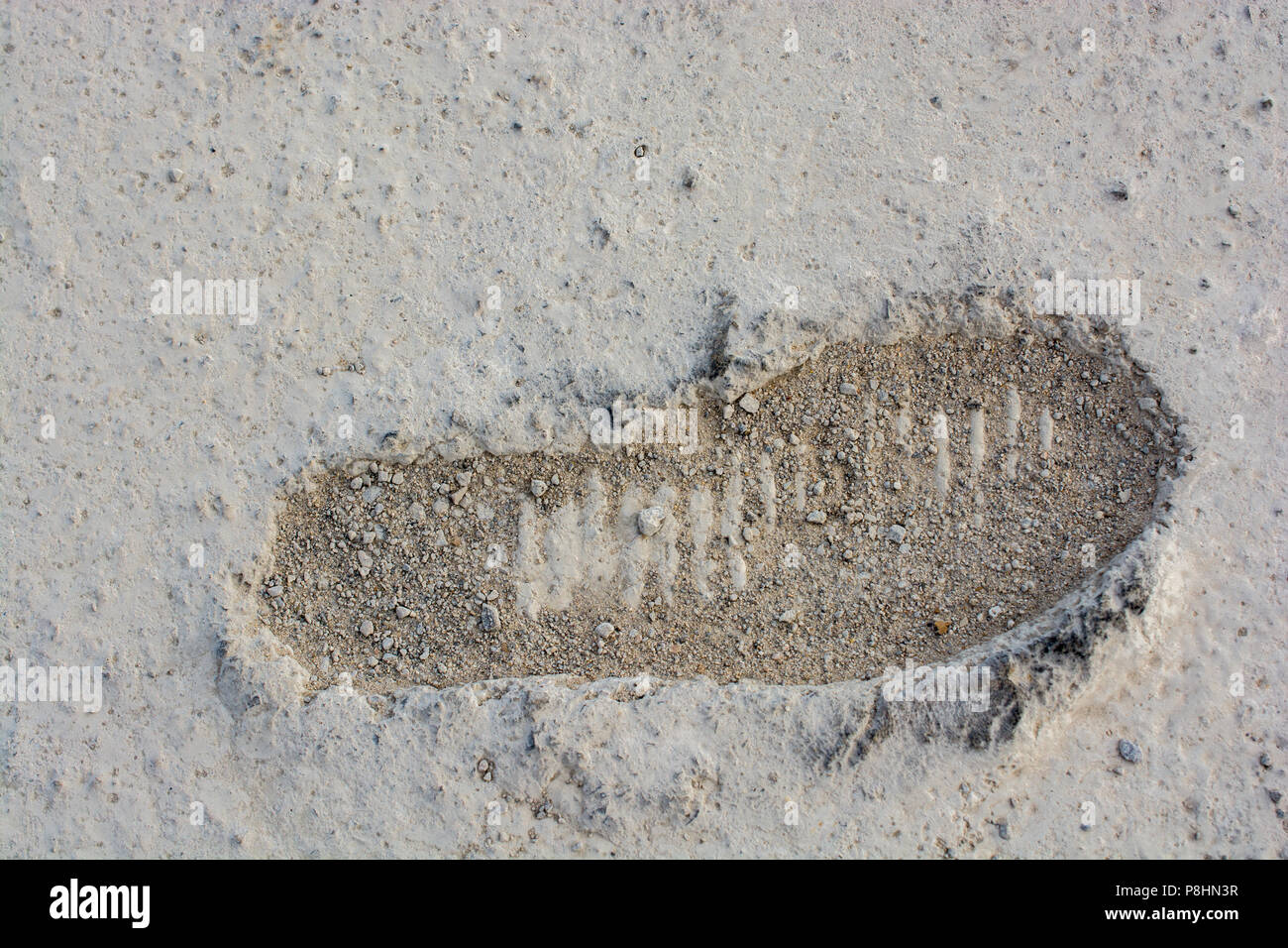 Footstep pattern seen on a concrete background Stock Photo - Alamy