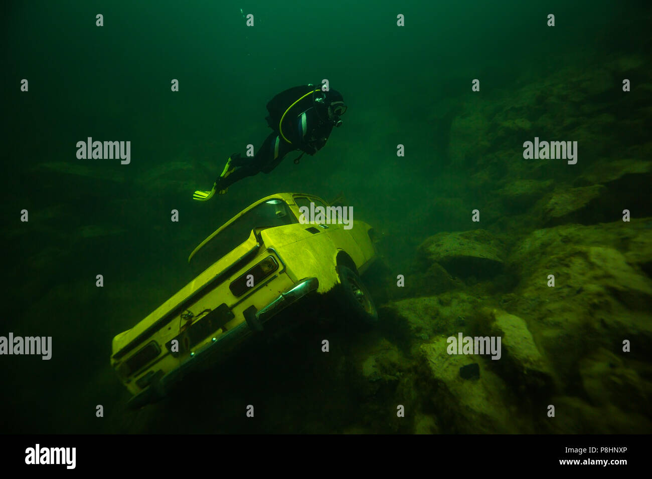 The machine is submerged at the bottom of the lake Stock Photo - Alamy