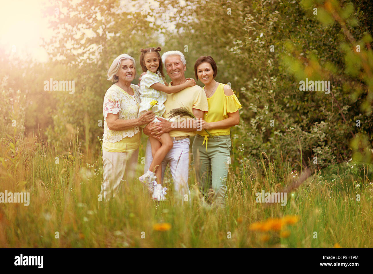 happy family resting Stock Photo - Alamy