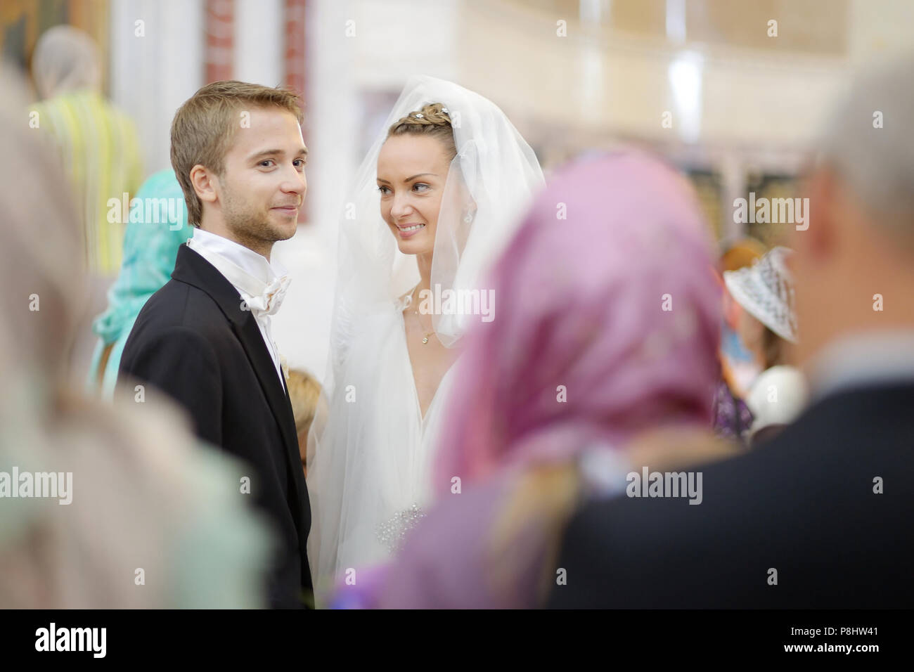 Bride and groom before wedding altar hi-res stock photography and ...
