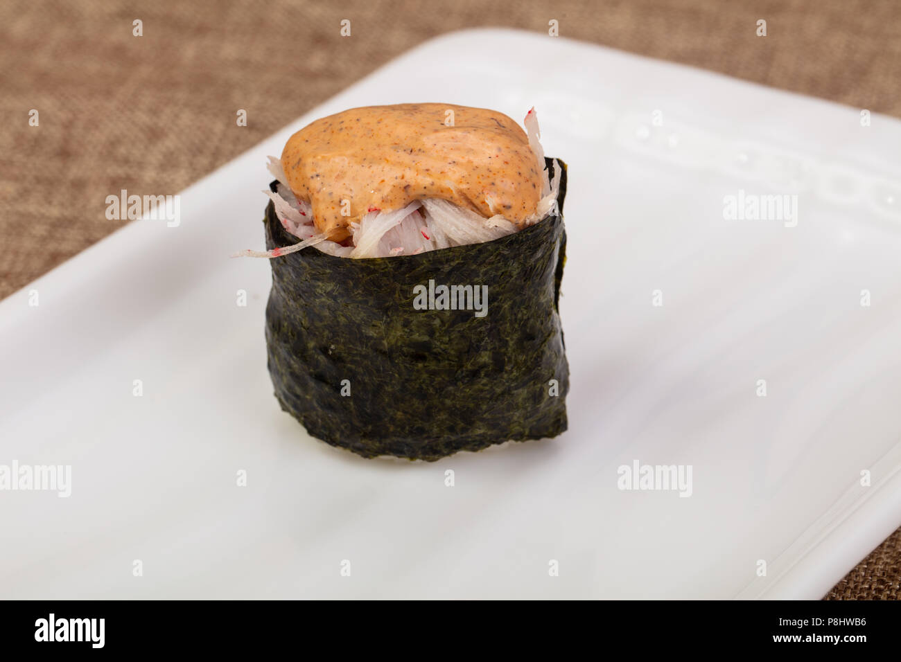 Spicy gunkan sushi with sauce Stock Photo - Alamy