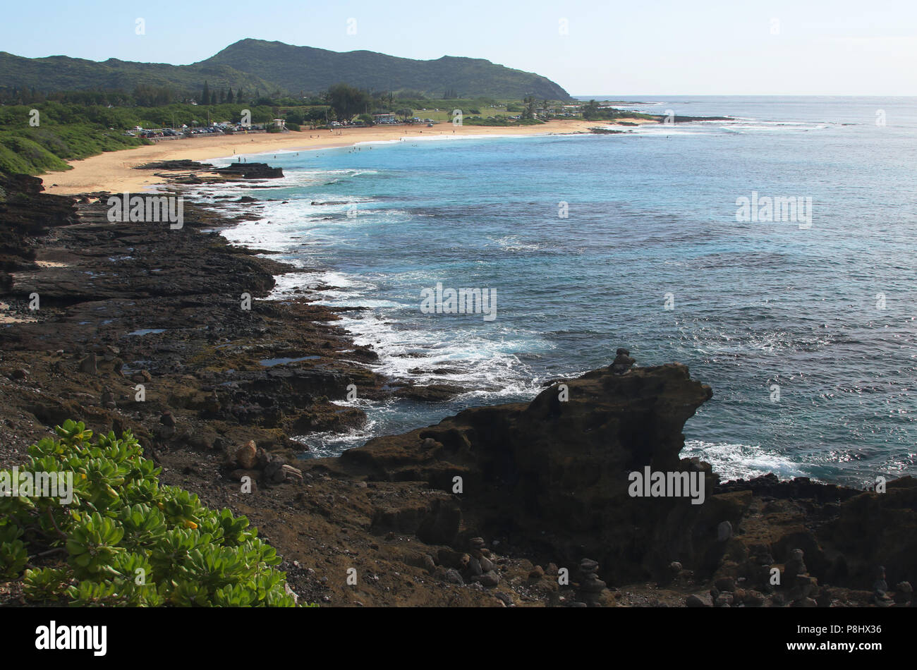 Halona Cove shoreline, including a volcanic rock beach and Sandy Beach ...