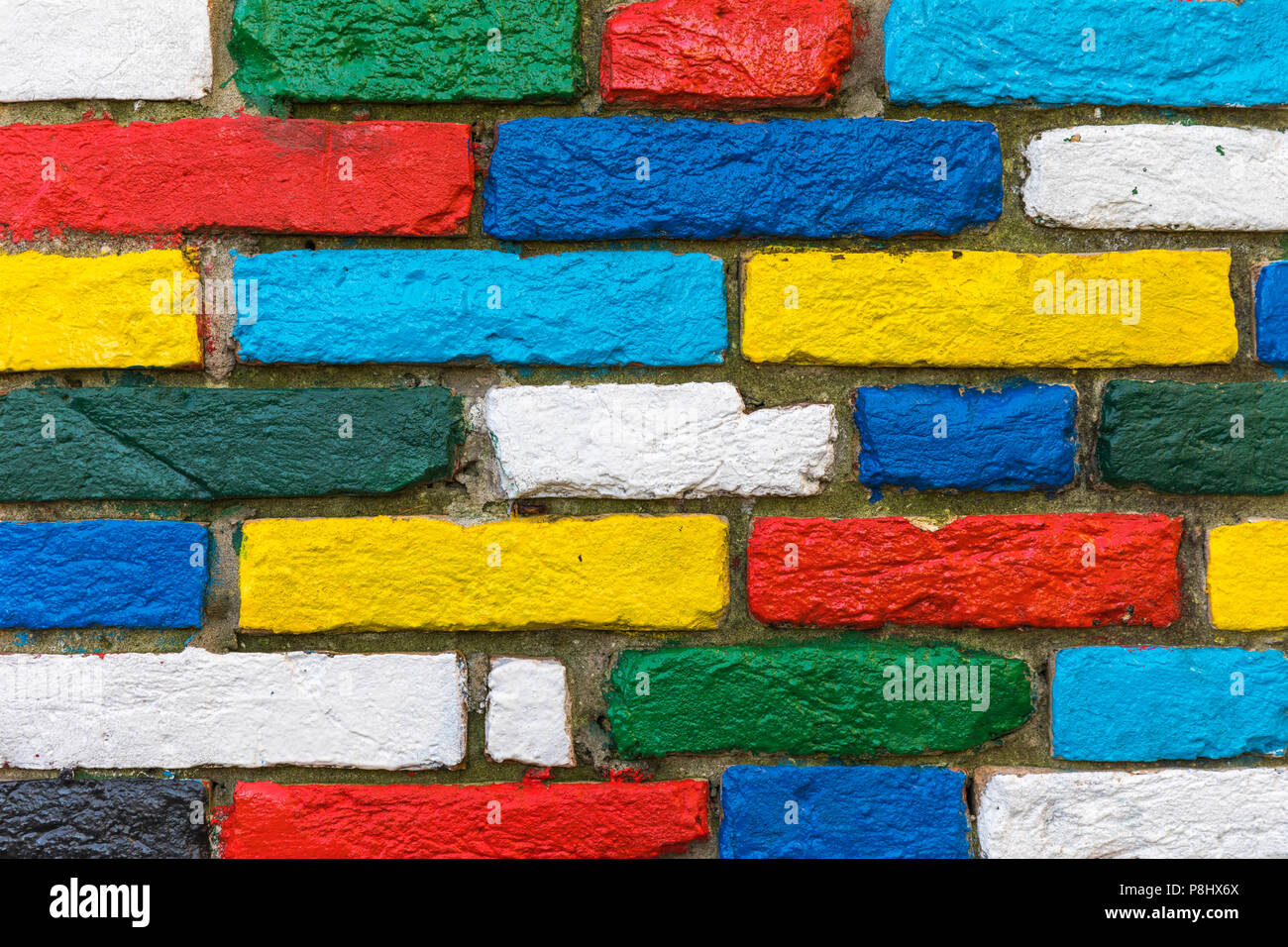 Colorful brick wall background. Rainbow colourful brick wall. Colorful ...